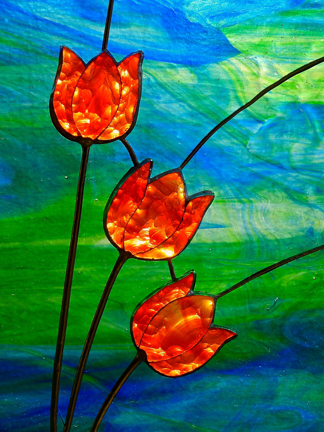 Fused tulip stained glass panel | Foiled and Faceted Stained Glass